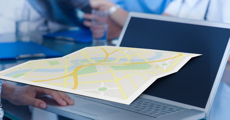 Navigation Map Over Against Mid Section of Man Using Laptop at Office ...