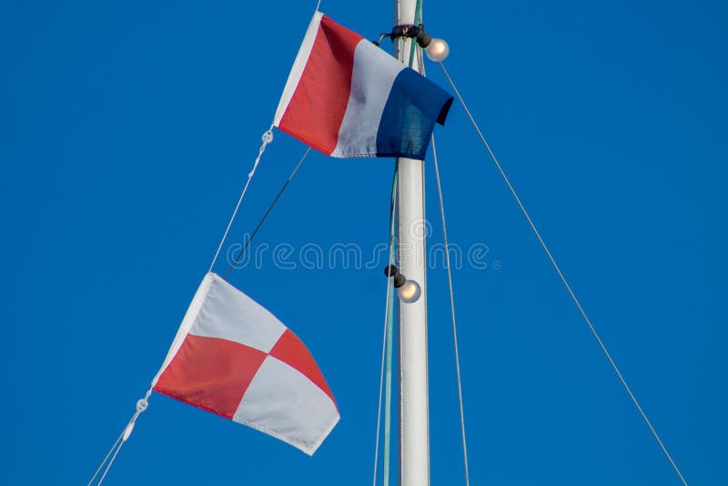 Navigational signal flags stock photo. Image of tango - 98772224