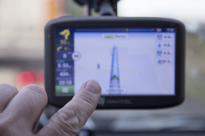 Navigator in the Car. Driving a Car Using the Navigator Stock Image ...