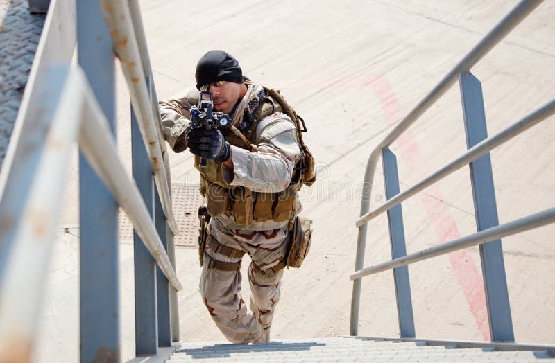 US Navy EOD Aims Rifle from Humvee Editorial Stock Photo - Image of ...