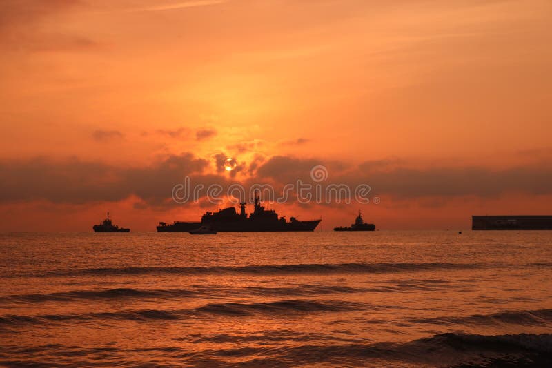 Navy ship at sea stock photo. Image of sunrise, sunset - 141094756