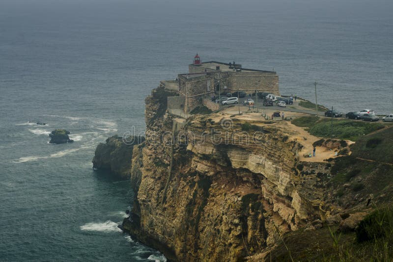 Nazare Lighthouse, Portugal Stock Image - Image of oceanscape, harbor ...