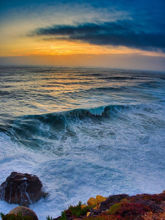 Nazare waves at sunset stock photo. Image of nazare - 170813984