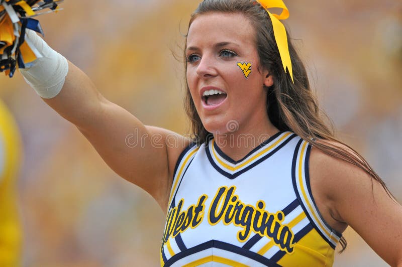 NCAA 2012 - WVU Cheerleader Editorial Image - Image of football, game ...