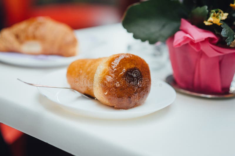 Neapolitan baba with rum stock photo. Image of bakery - 140789842