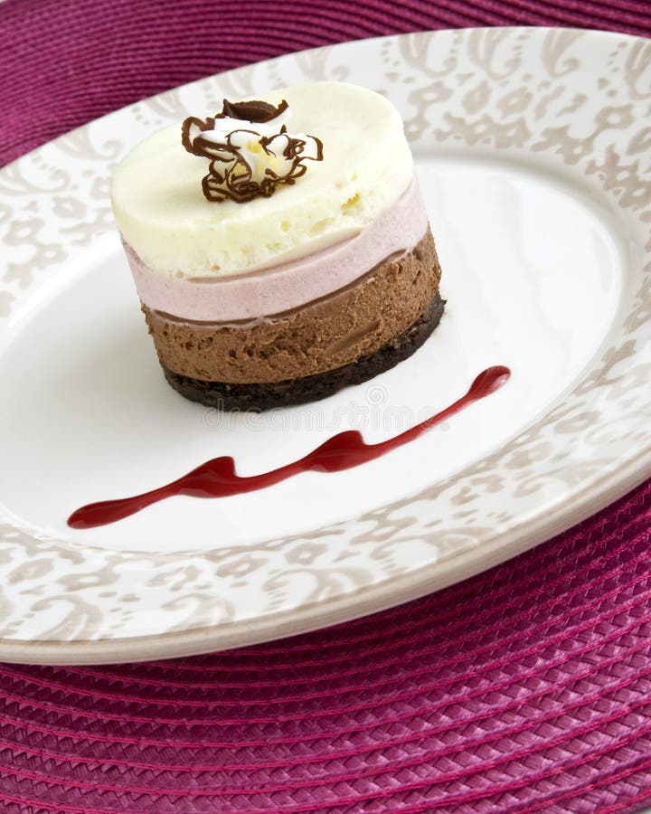 Neapolitan Dessert Sprinkled with Icing Sugar and Decorated with Almond ...
