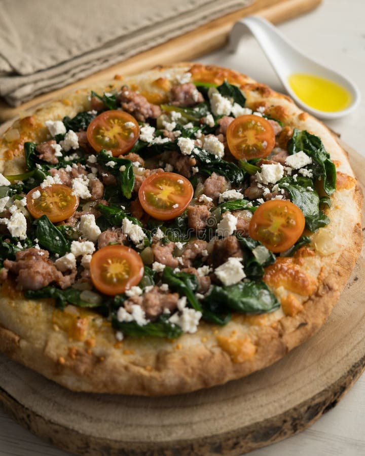 Neapolitan Pizza with Sausage and Spinach. Stock Image - Image of cook ...