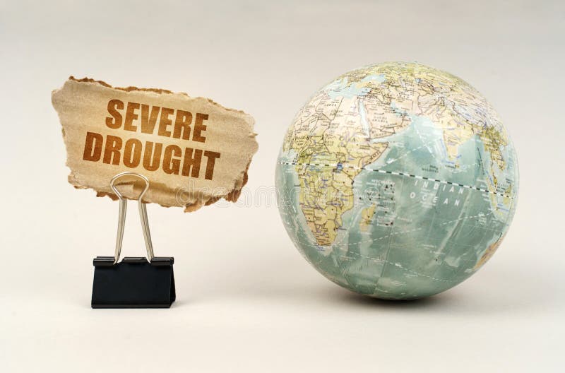 Near the Globe There is a Clip with a Cardboard Plate on Which it is ... Near the Globe There is a Clip with a Cardboard Plate on Which it is ...