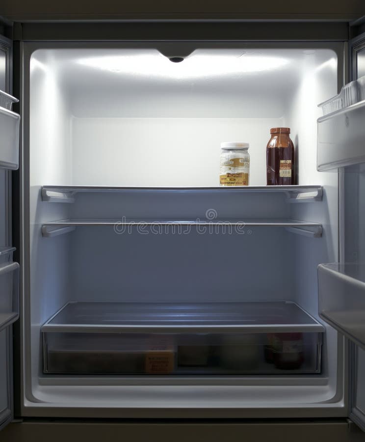 Nearly Empty Refrigerator with Minimal Contents Stock Image - Image of ...