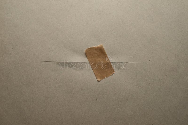 A Neat Cut of a Brown Sheet of Paper Taped Stock Image - Image of ...