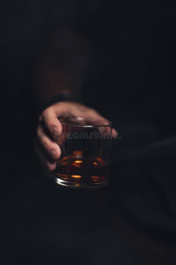 Bourbon in the hand stock image. Image of single, human - 229625441