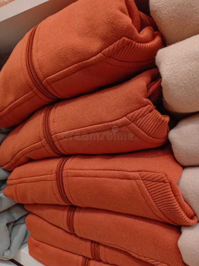 Neat rows of clothes stock photo. Image of brown, limb - 204305026