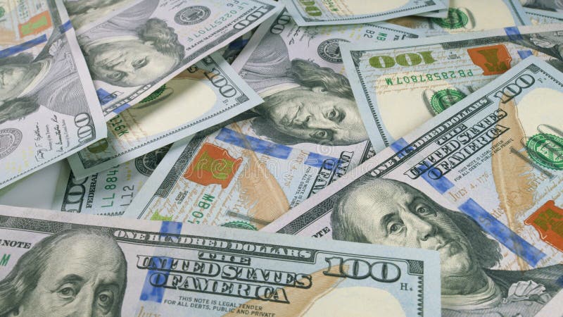 A Neat Stack of Hundred Dollar Bills on a Surface, Highlighting the ...