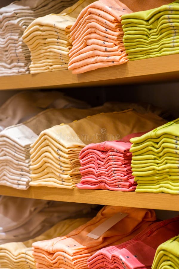 Neat Stacks of Folded Clothing Stock Photo - Image of neat, clothing ...