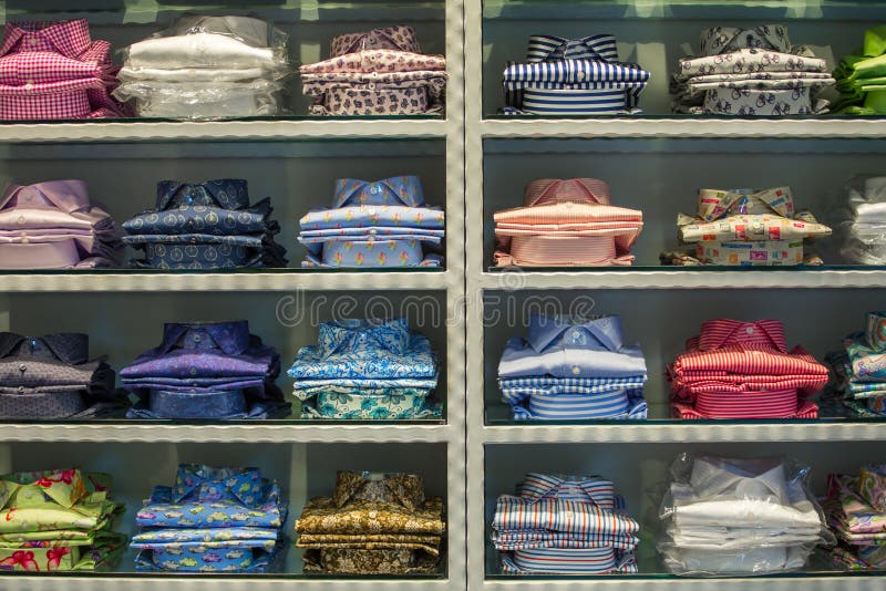 Neat Stacks of Folded Clothing Stock Photo - Image of shop, colorful ...