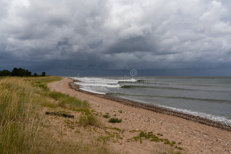 Neat Waves Breaking on a Sandy Beach with Marsh Grass and Sand Dunes ...