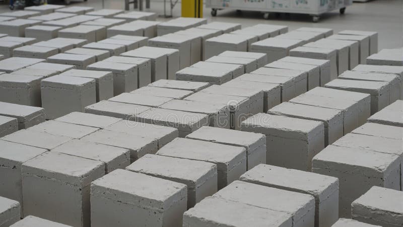 Neatly Arranged Concrete Blocks Drying in a Factory Setting with Soft ...