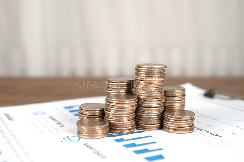 A Neatly Arranged Pile of Dollar Coins is on the Document Stock Photo ...