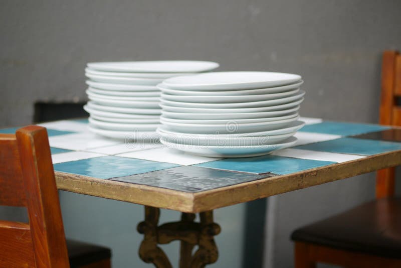 Neatly Arranged Stacked Plates Displayed Beautifully on a Colorful ...