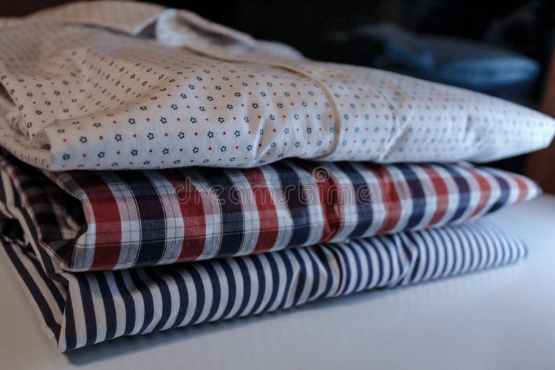 Neatly Folded Button Down Shirts. a Stack of Three Stock Image - Image ...