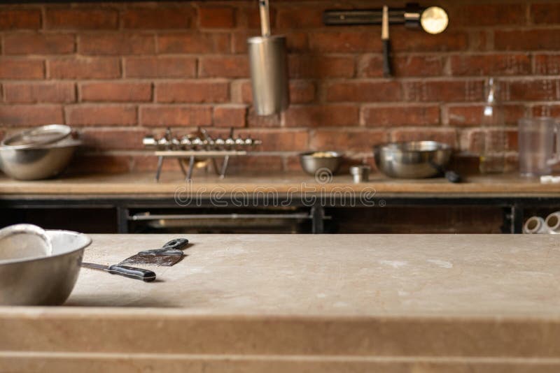 Kitchen Countertop with Metal Cookware and Tools Arranged Neatly ...