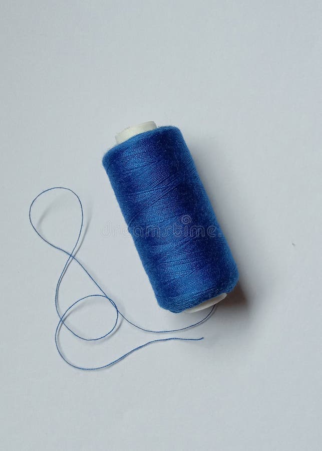 Neatly Rolled Blue Sewing Thread Stock Image - Image of rolled, thread ...