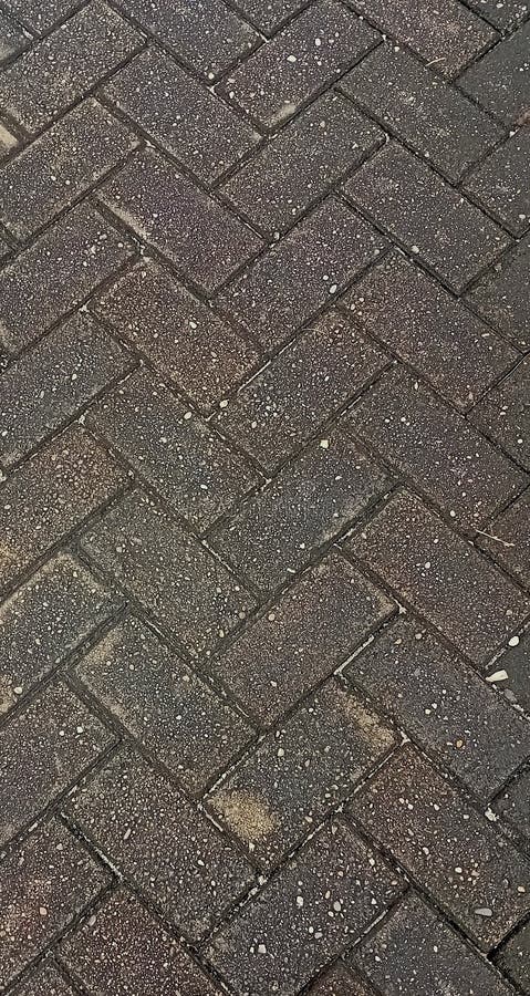 Neatly Stacked Black Bricks Stock Photo - Image of sand, floor: 266453074