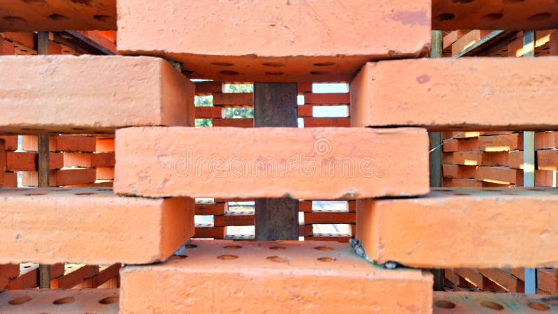 Neatly Stacked Red Bricks with Visible Gaps, Creating a Geometric ...