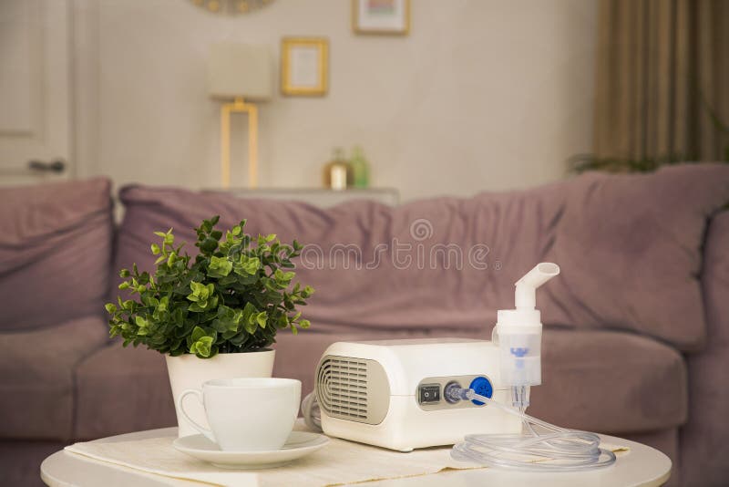 Nebulizer on the Coffee Table Near the Sofa in the Room Stock Photo ...