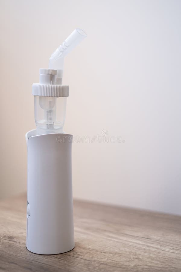 The Nebulizer for Inhalation is on the Table. Treatment of Colds and ...
