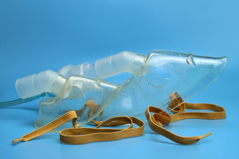 Nebulizer Inhaler Mask on a Blue Background Stock Image - Image of ...