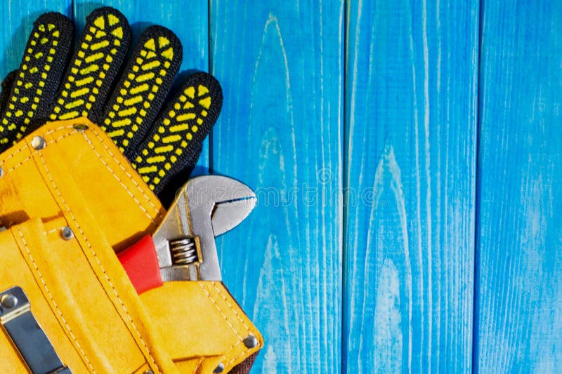 A Necessary Set of Tools in a Bag on a Blue Wooden Background Stock ...