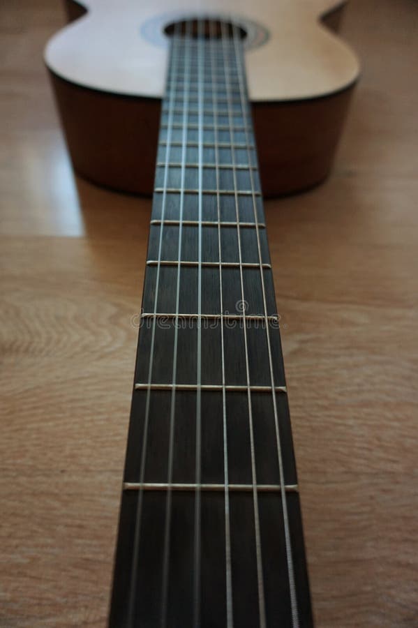 The Neck of a Six-stringed Guitar with Stringed Strings Stock Image ...