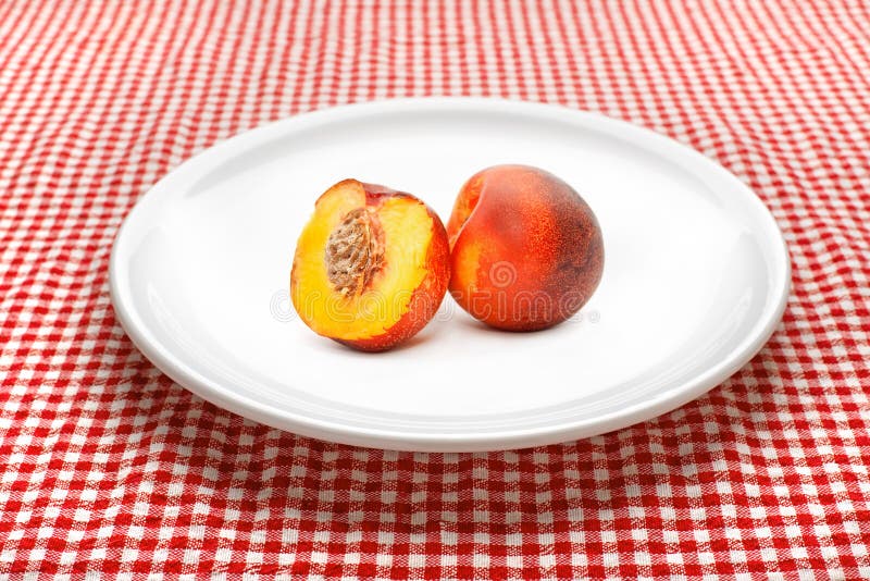 Nectarine on plate stock photo. Image of diet, agriculture - 34375336