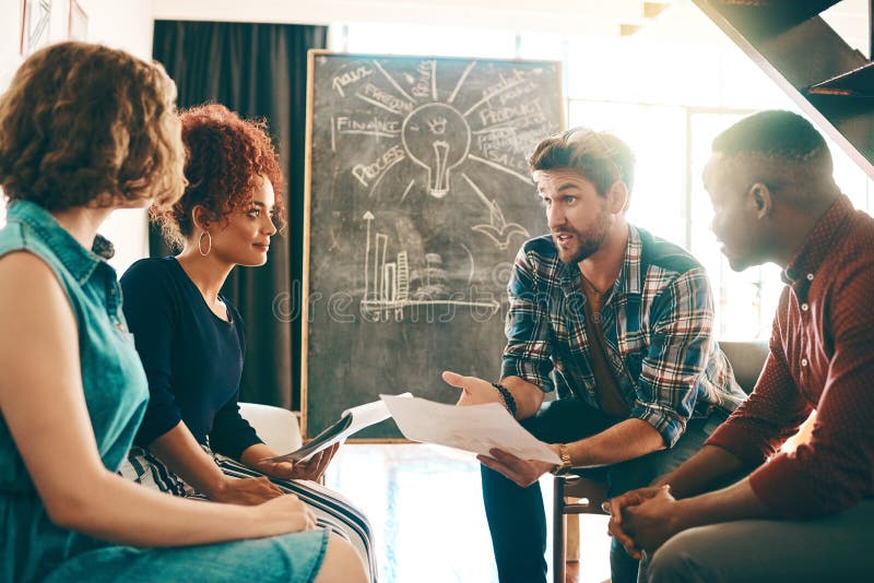 We Need All Hands on Deck for this Project. a Group of Designers Having ...