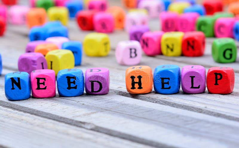 We can help words on table stock image. Image of closeup - 78168255