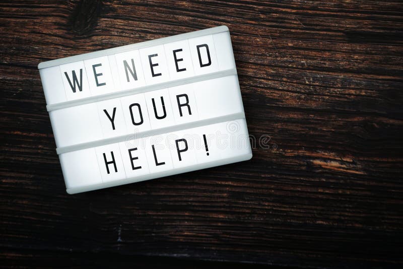 We Need Your Help Word Text in Light Box on Wooden Background Stock ...