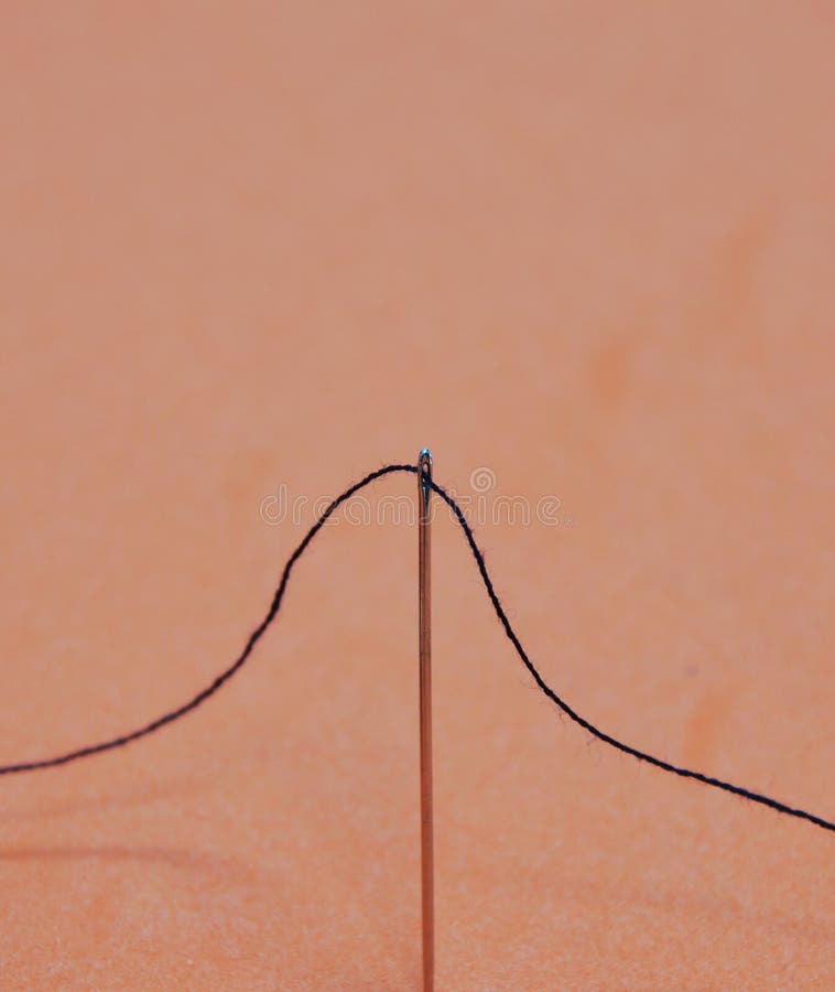 Needle and black thread stock image. Image of stitch - 64358719