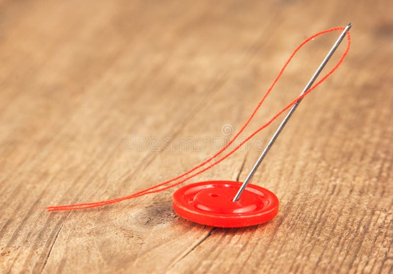 Needle and a button stock photo. Image of fiber, color - 133292436
