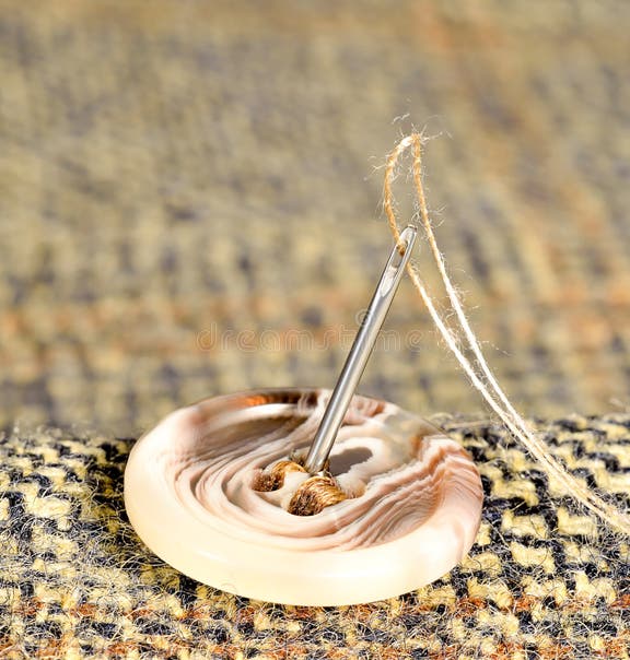 Needle and button stock photo. Image of multi, equipment - 70299940