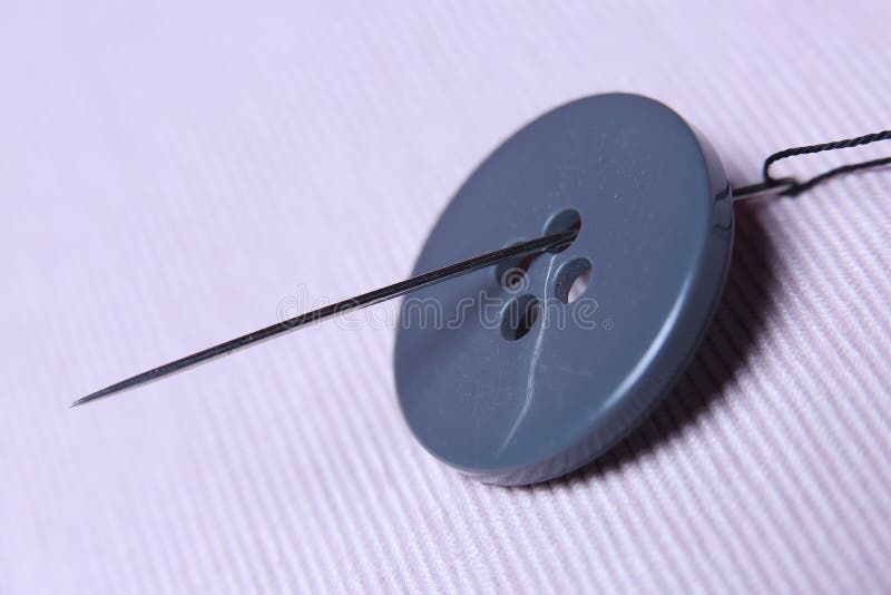 Needle in Button, White Background Stock Image - Image of sews, button ...