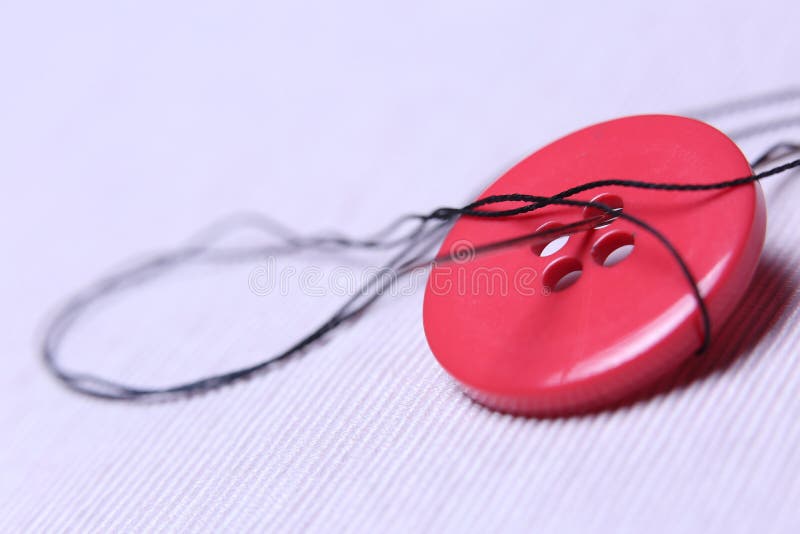 Needle in Button, White Background Stock Photo - Image of blue, sewing ...