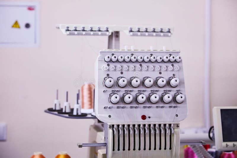 12 Needle Compact Embroidery Machine. Industrial Embroidery Stock Photo ...