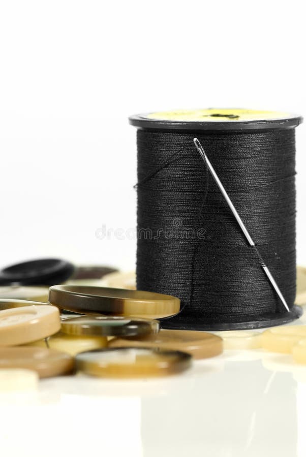 Needle, cotton and buttons stock photo. Image of thread - 12512984