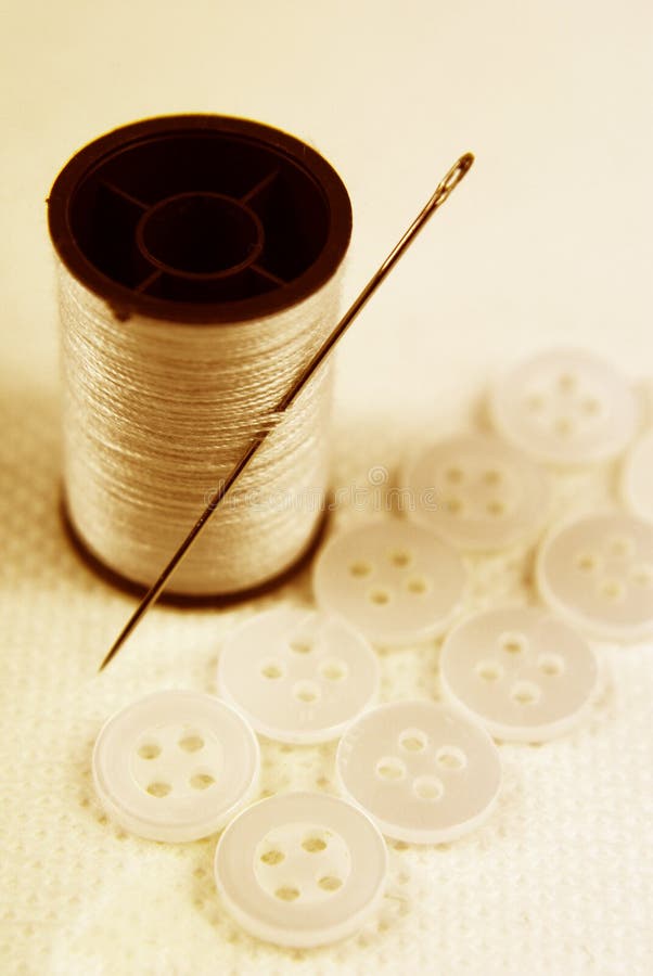 Needle and cotton in sepia stock photo. Image of cotton - 11042756