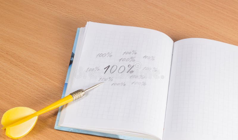 Needle of a Dart on a Notebook Stock Photo - Image of notepad ...