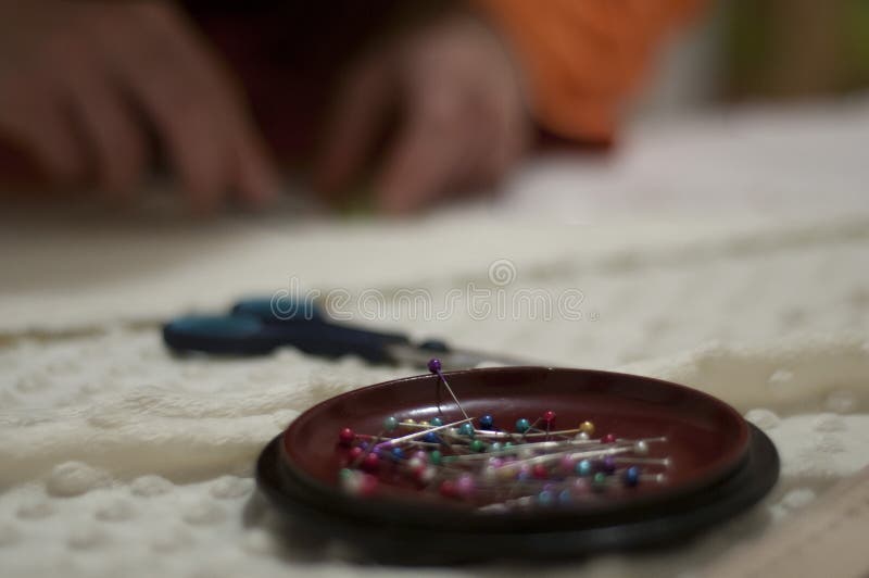 Needle in the Hands of a Seamstress Stock Image - Image of mini, craft ...