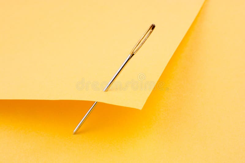 Needle Pierced Yellow Note Paper Stock Photo - Image of hold, business ...