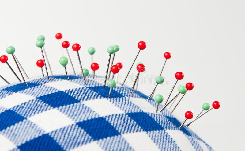 Needle in pin cushion stock photo. Image of stitch, creative - 23571296