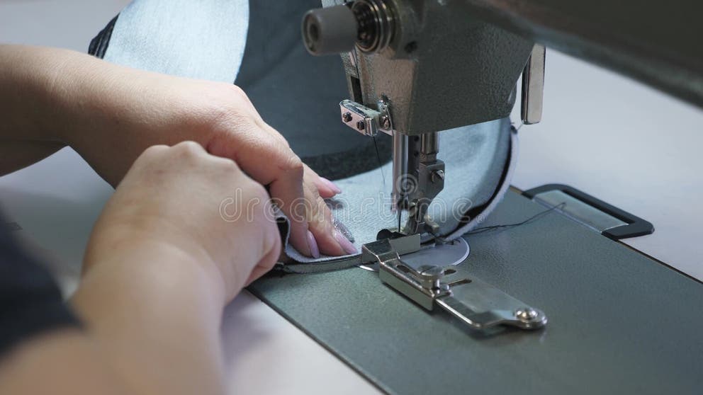 Needle of the Sewing Machine in Motion, Close-up. Needle of the Sewing ...